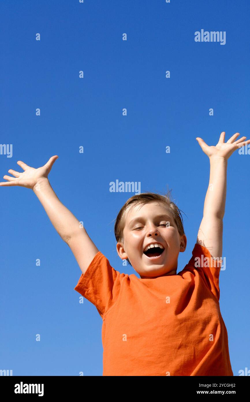 Joyful boy success, rejoice, achievement Stock Photo - Alamy