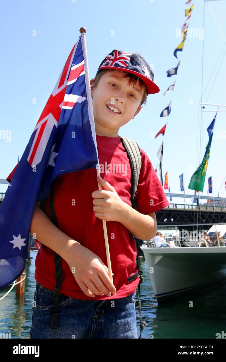 Aussie boy with flag harbourside Stock Photo - Alamy