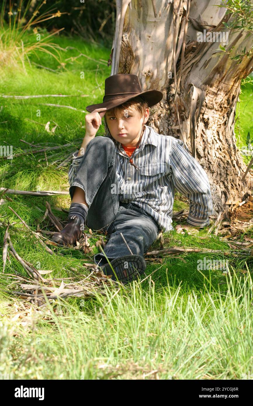 Outback boy in rugged bushland Stock Photo - Alamy