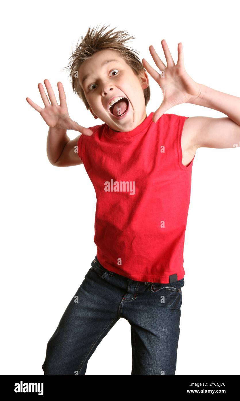 Crazy Face boy child jumping Stock Photo - Alamy