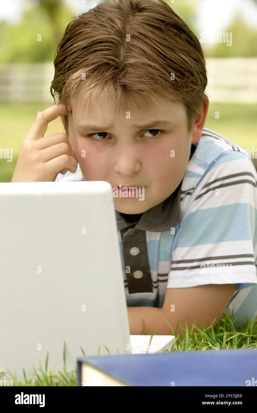 Boy studying english online laptop hi-res stock photography and images ...