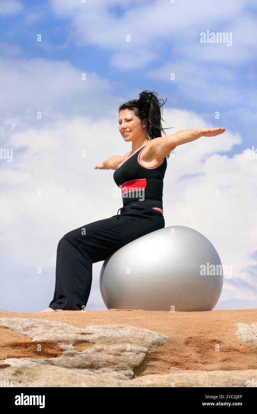Female Pilates Ball Balance Stock Photo - Alamy