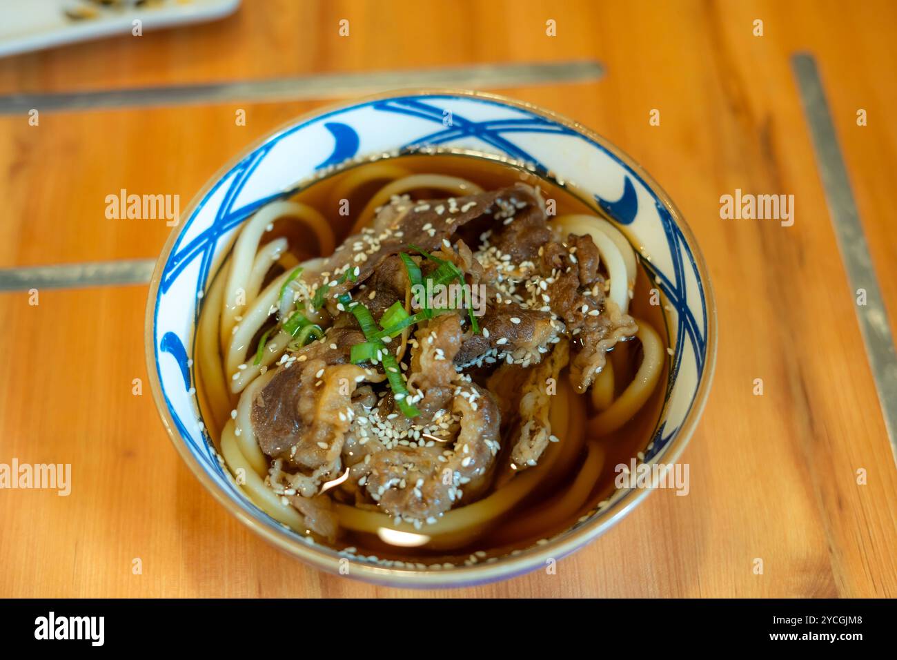 Japanese Cuisine hot soup udon noodle as kake udon with a mild broth ...