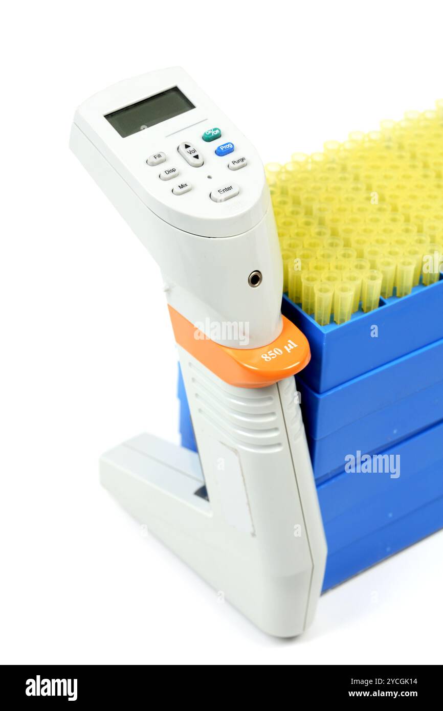 Electronic pipettor and tray of pipet tips Stock Photo - Alamy