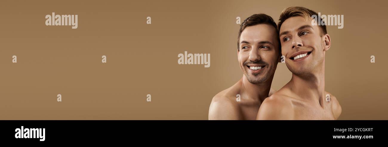 Two young men share smiles and affection, celebrating their ...