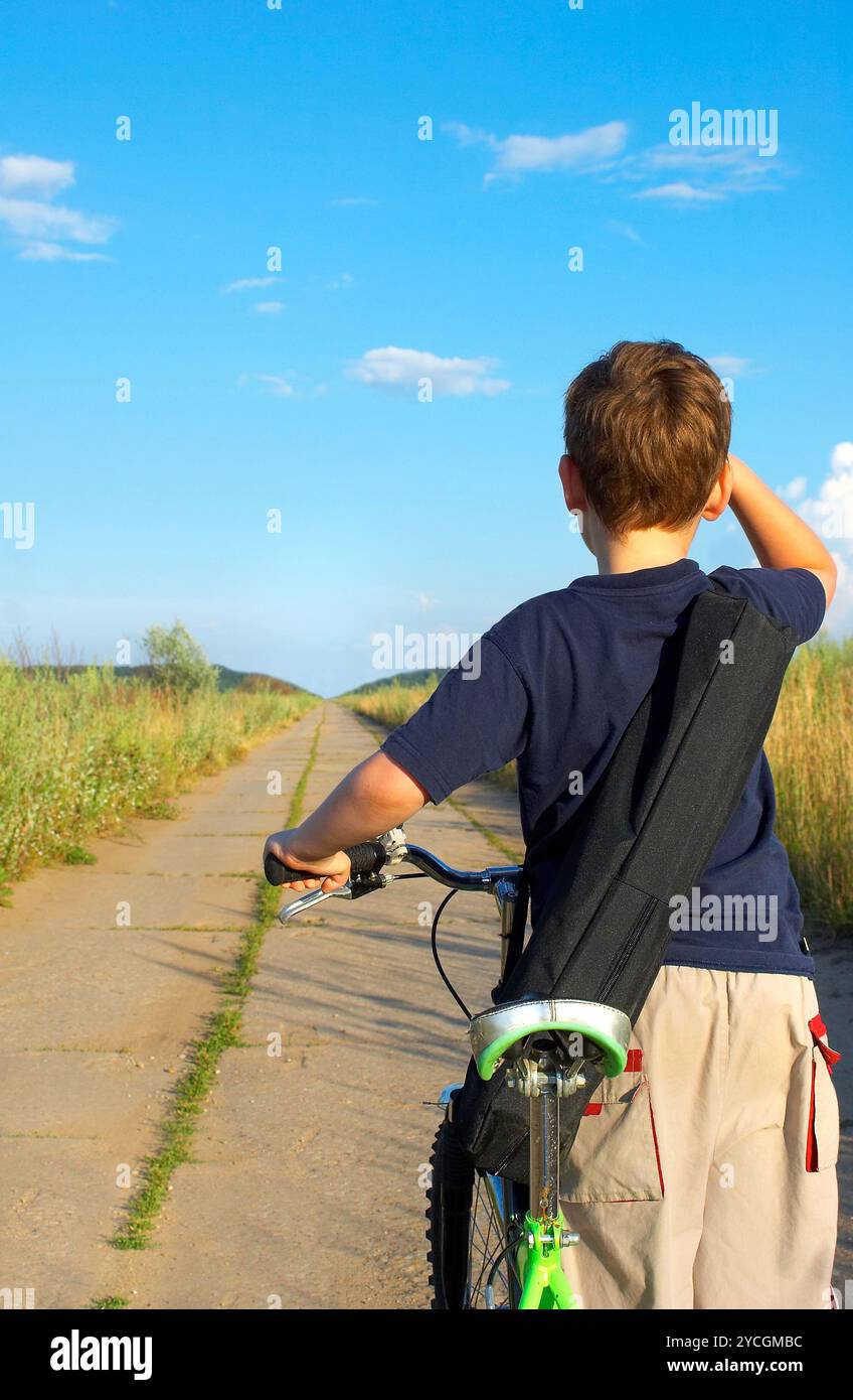 Boy direction bike hi-res stock photography and images - Alamy