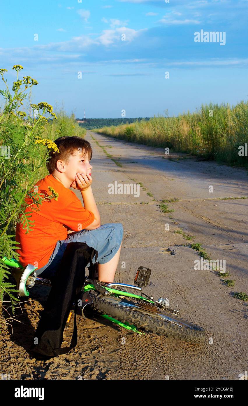 Boy direction bike hi-res stock photography and images - Alamy