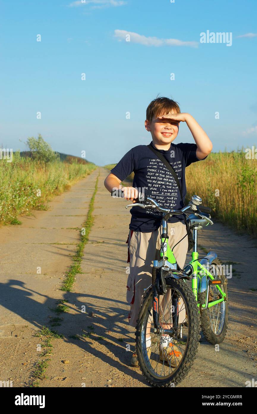 Boy direction bike hi-res stock photography and images - Alamy