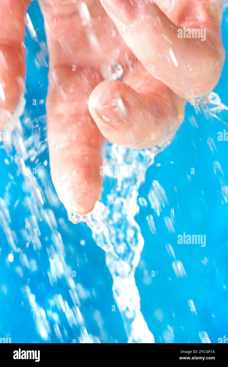 Human hand and water Stock Photo - Alamy