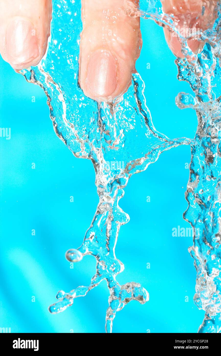 Human hand and water Stock Photo - Alamy