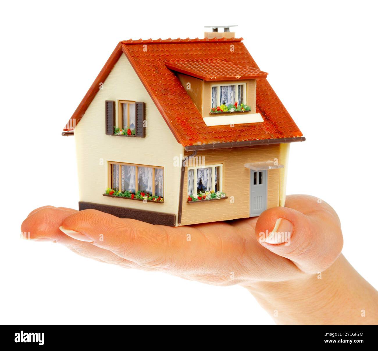 House in human hands Stock Photo - Alamy