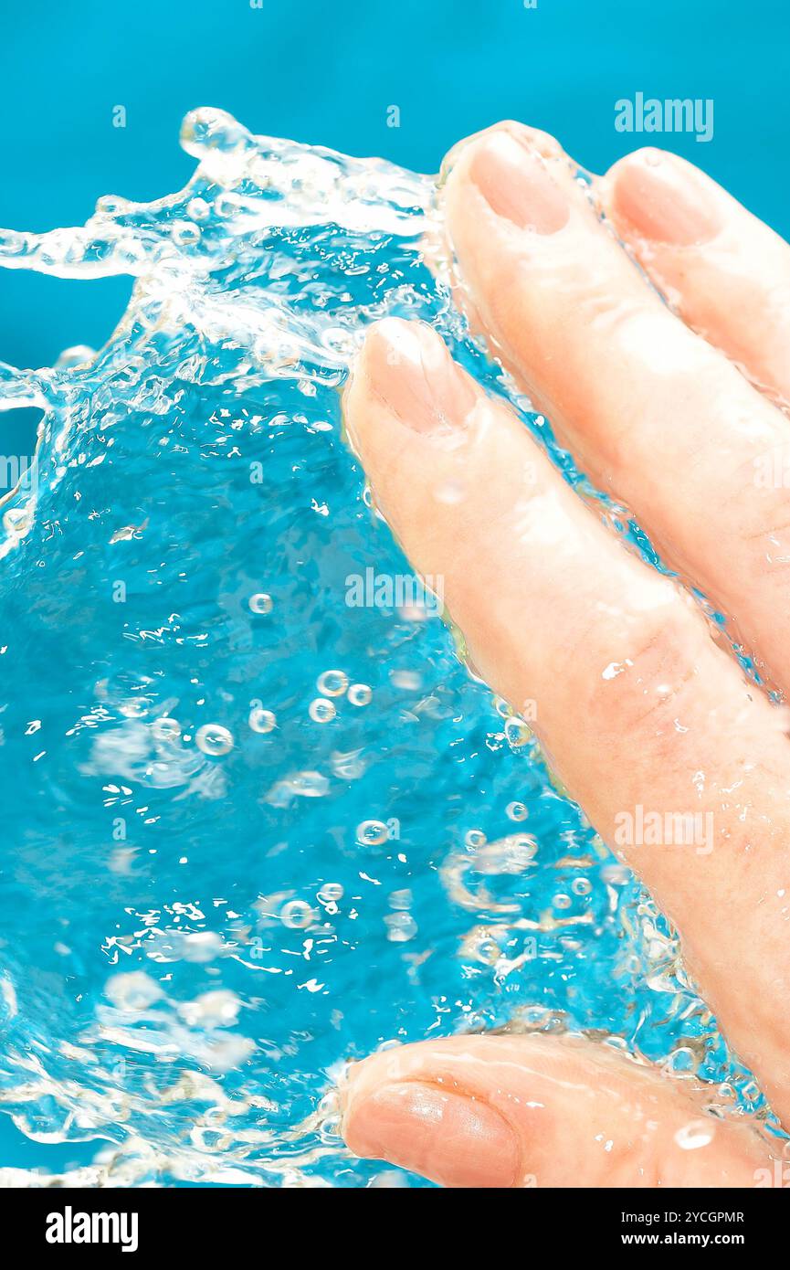 Human hand and water Stock Photo - Alamy