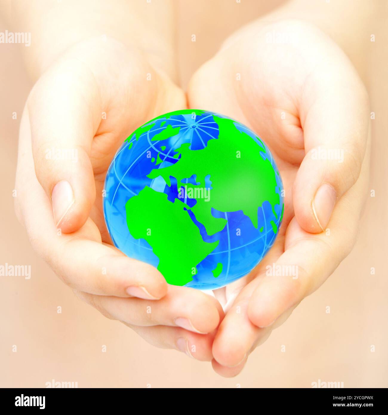 Hand of the person holds globe Stock Photo - Alamy