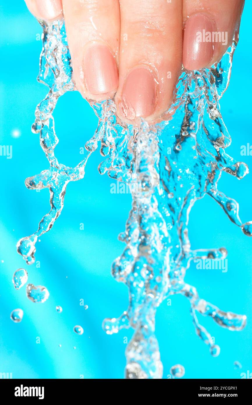 Human hand and water Stock Photo - Alamy