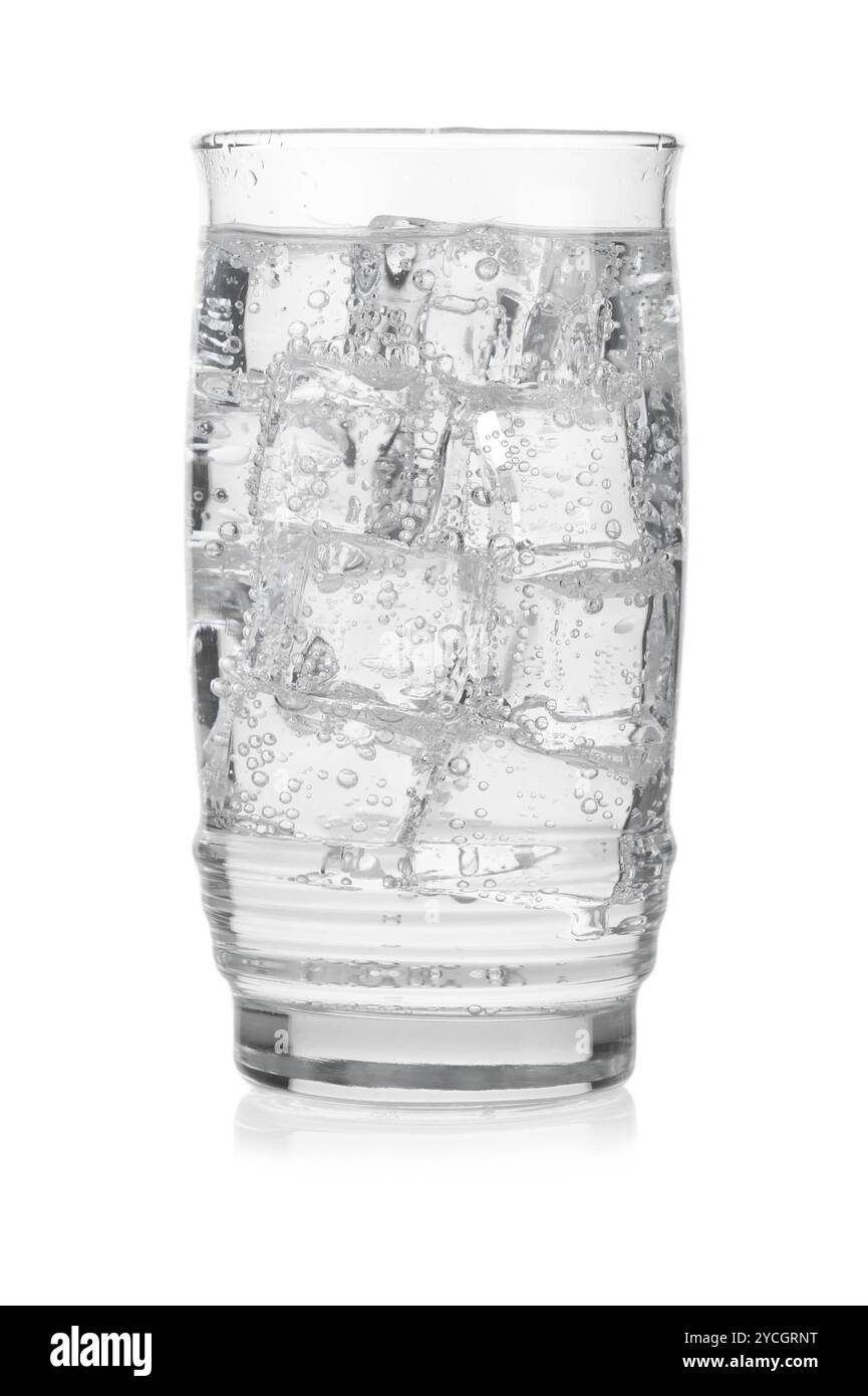 Glass of cold mineral water with ice cubes on white background Stock ...