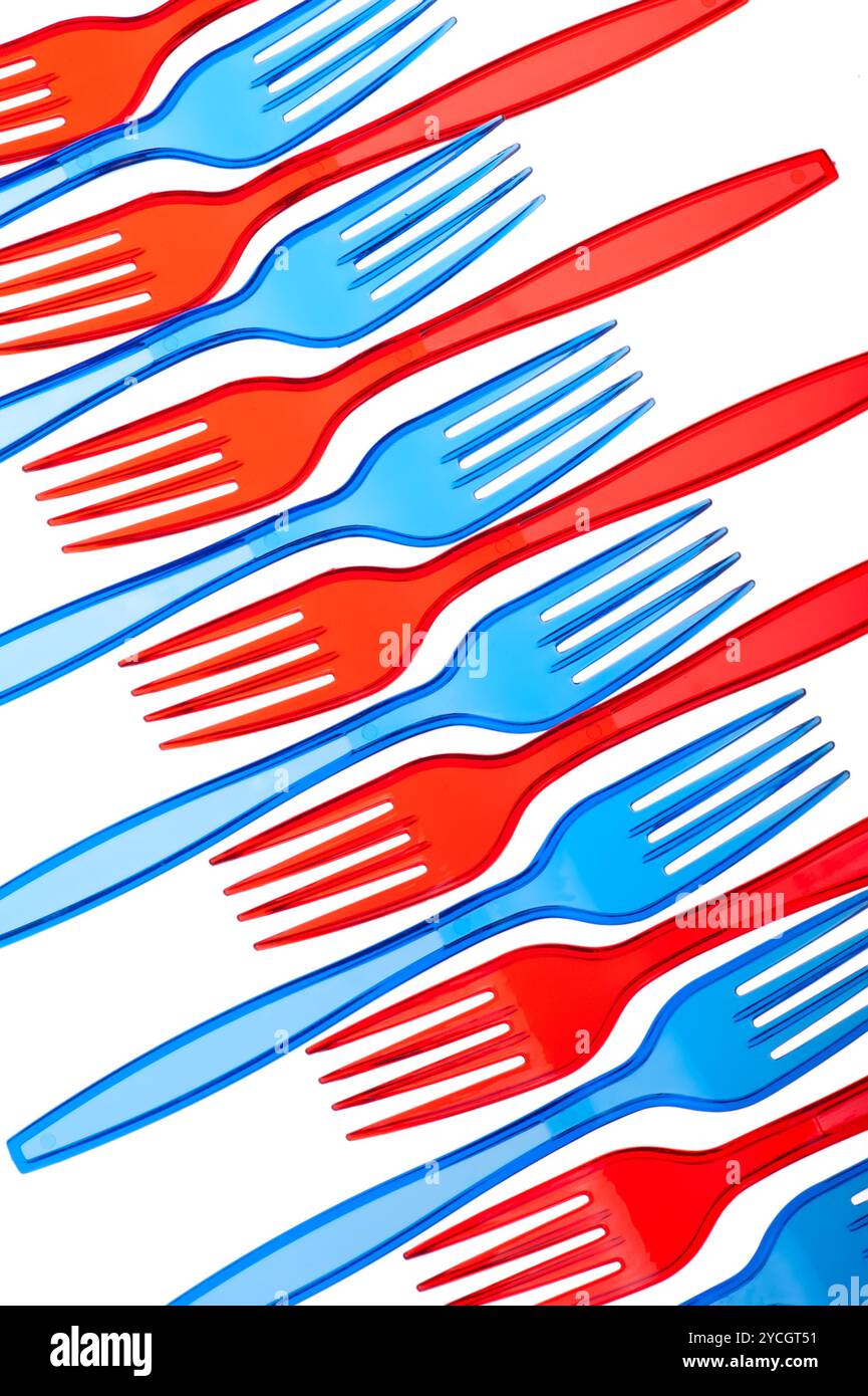 Disposable tableware. Colored plastic forks Stock Photo - Alamy