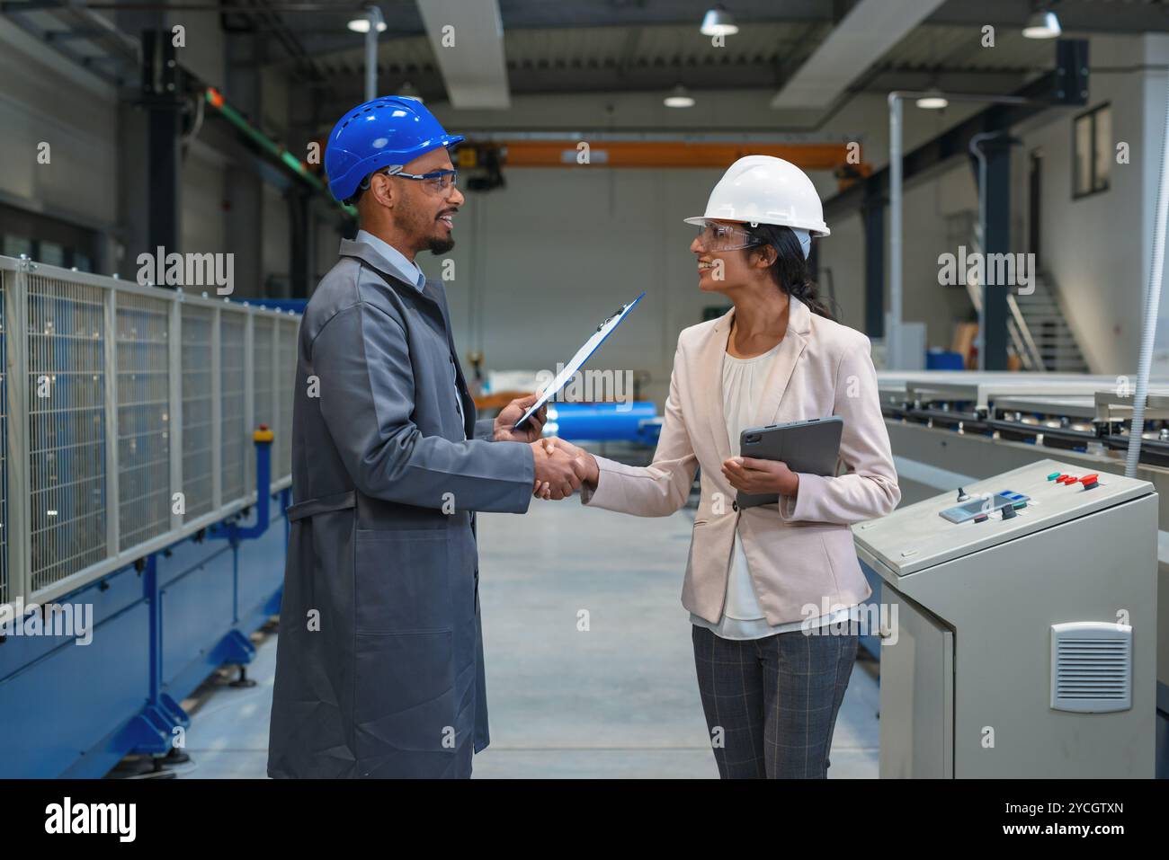 Business team industrial engineers walking hi-res stock photography and ...