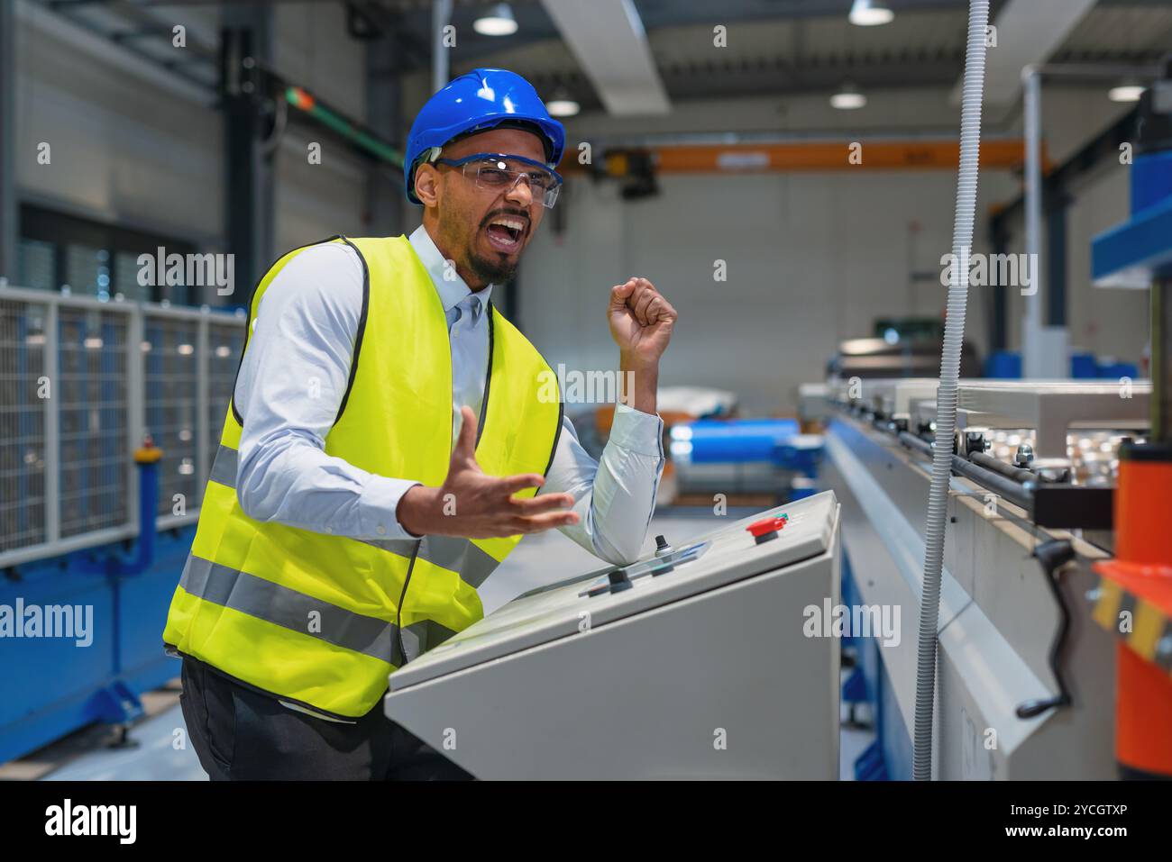 Male engineer controlling machine metal hi-res stock photography and ...
