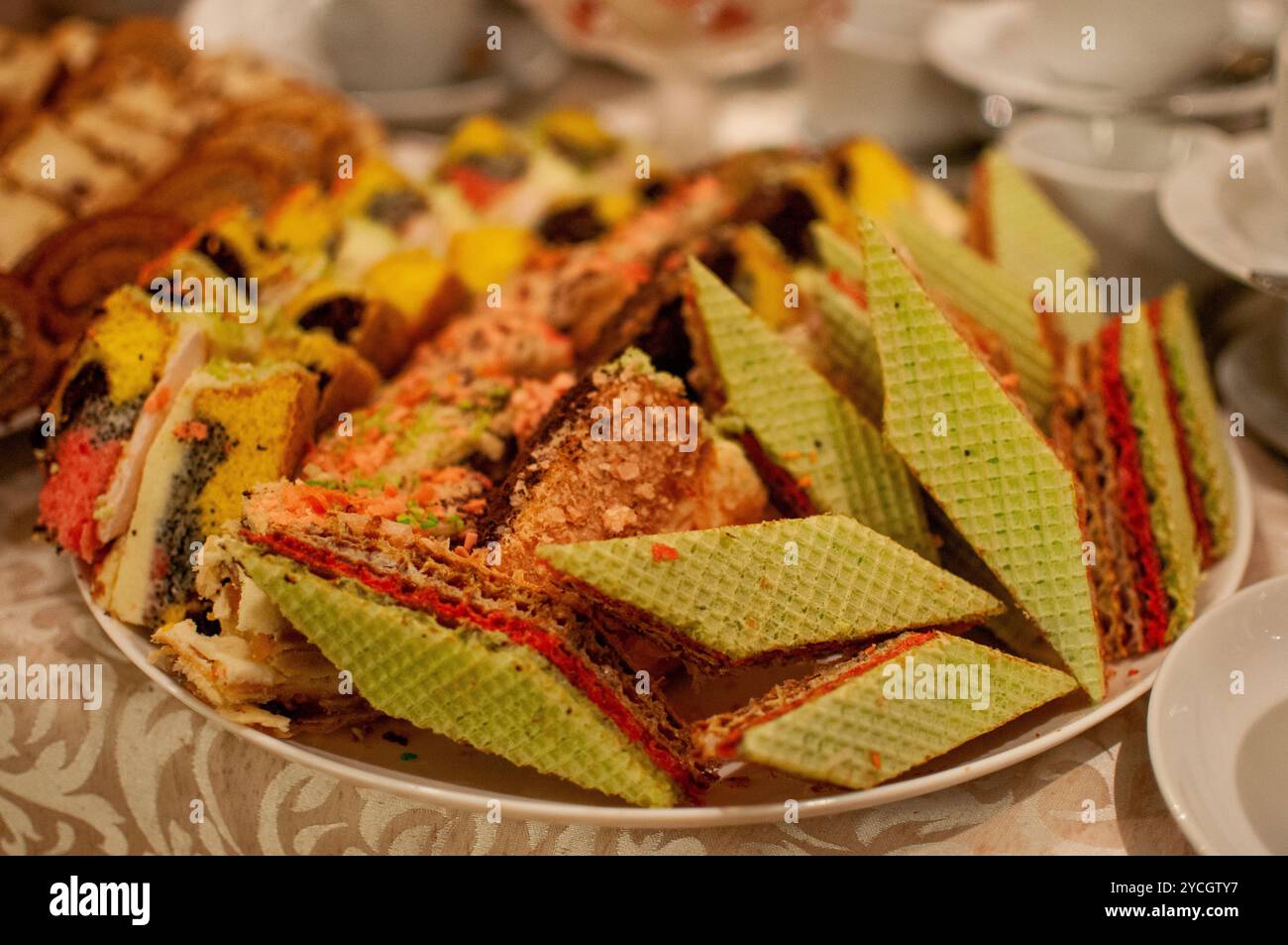 Colorful Assortment of Traditional Layered Pastries and Wafers on an ...