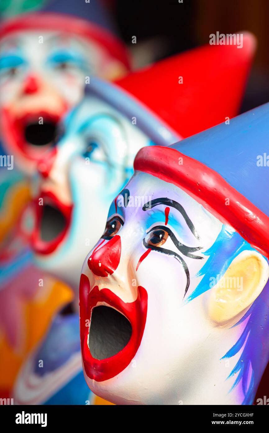 Side show carnival clowns with mouths open ready for play Stock Photo ...