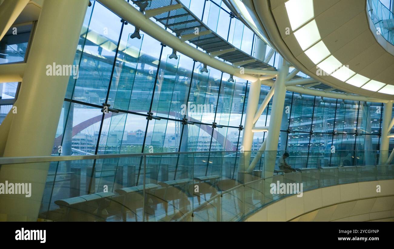 futuristic atrium environment, glass wall and metallic construction ...