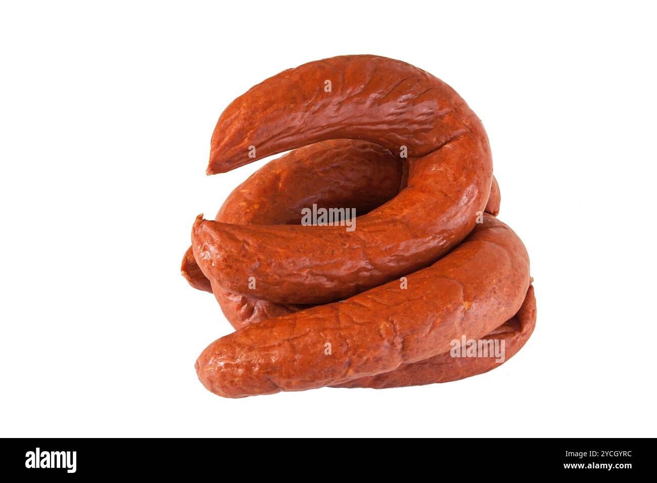 Pile meat flavour sausages on white Stock Photo - Alamy