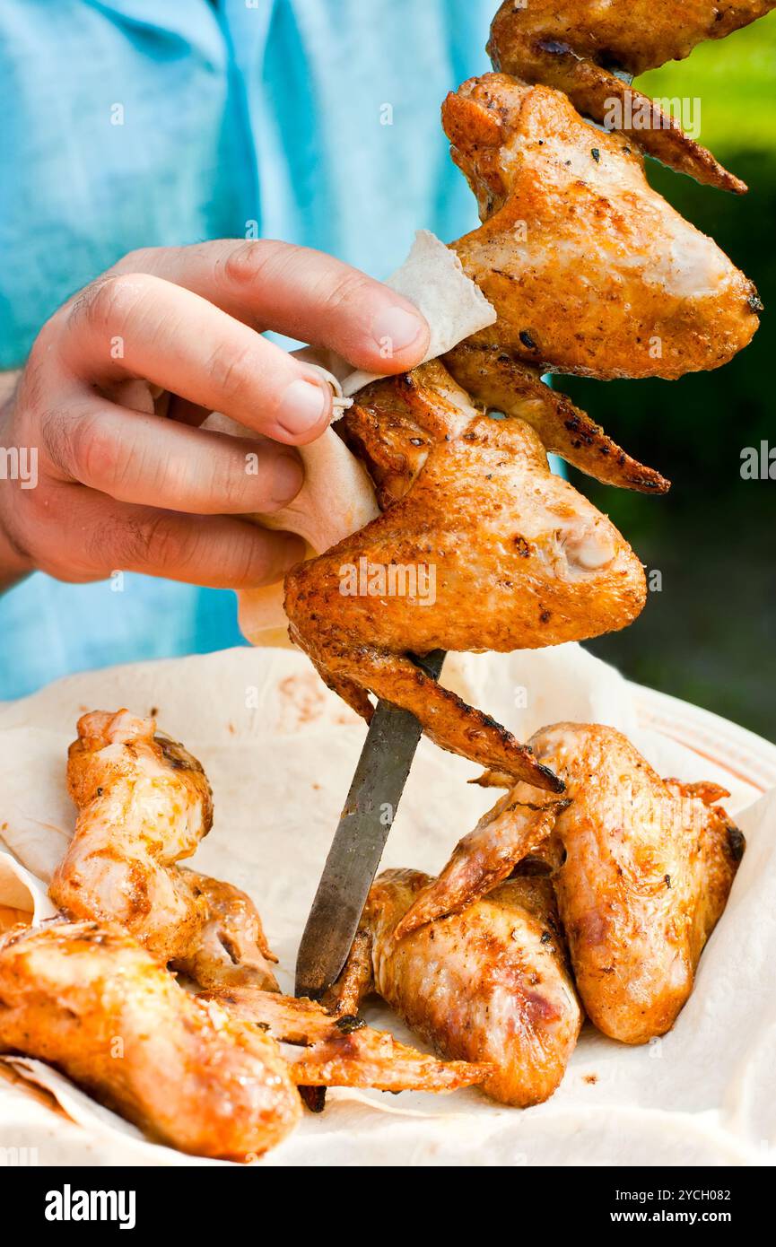 Chicken wings chef cooking man hi-res stock photography and images - Alamy