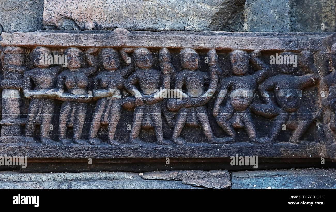 Carvings of a group of dancers and musicians on the Lord Shiva Temple ...