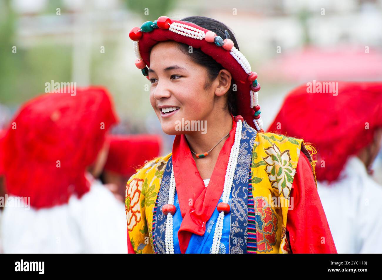 Tibetan girl performing folk dance Stock Photo - Alamy
