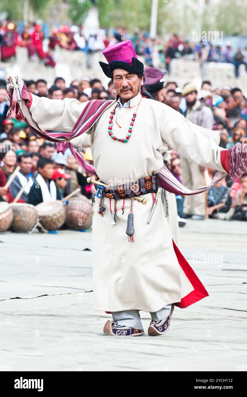 Tibetan man performing folk dance Stock Photo - Alamy