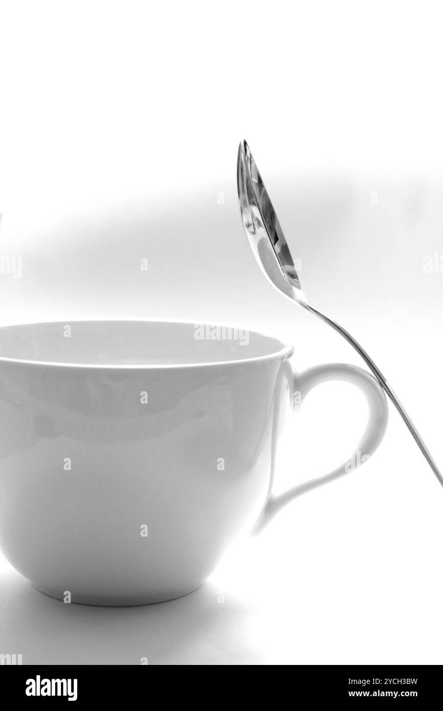 Cup with spoon Black and White Stock Photos & Images - Alamy