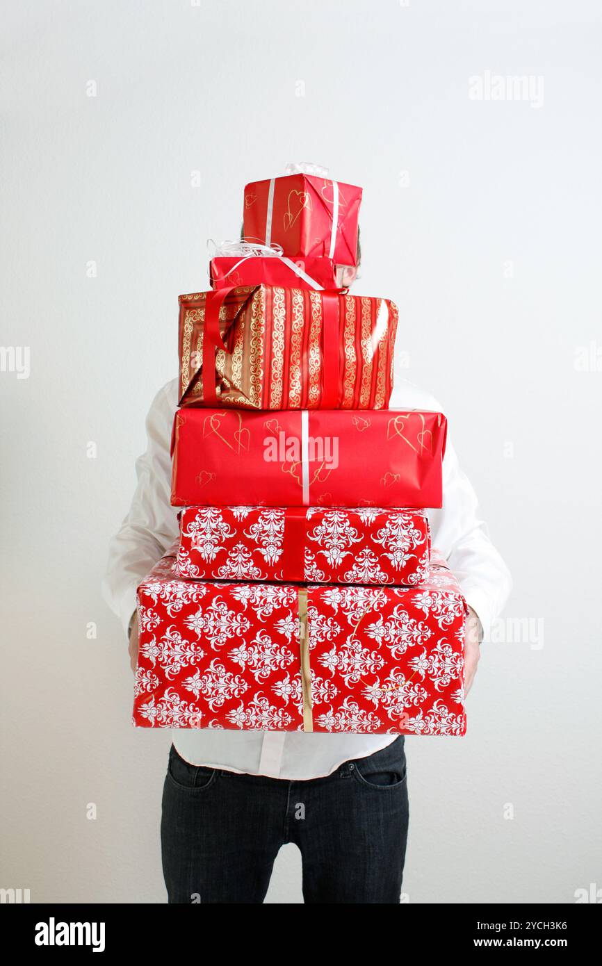 Man presenting several christmas hi-res stock photography and images ...