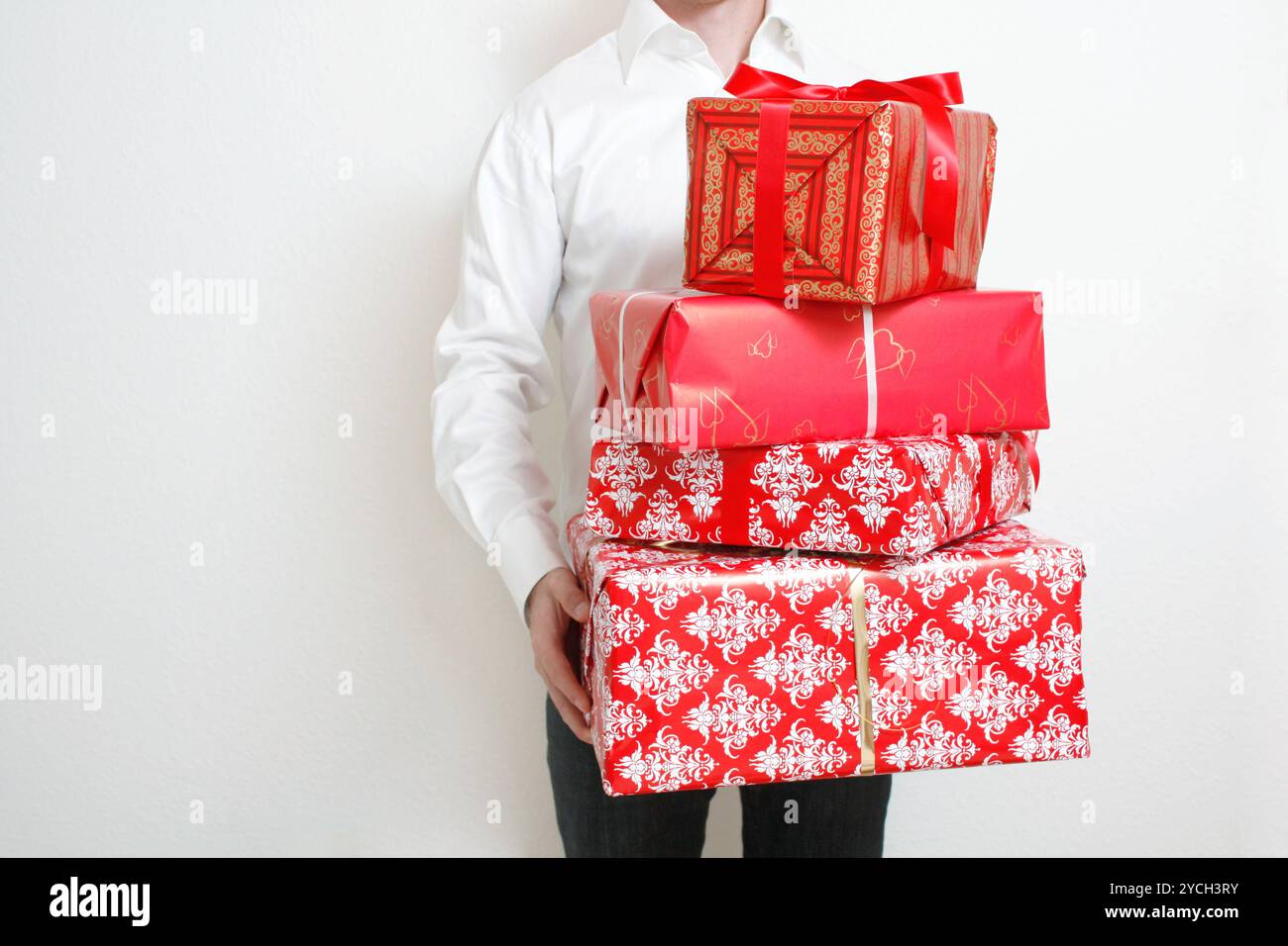 Man presenting several christmas hi-res stock photography and images ...