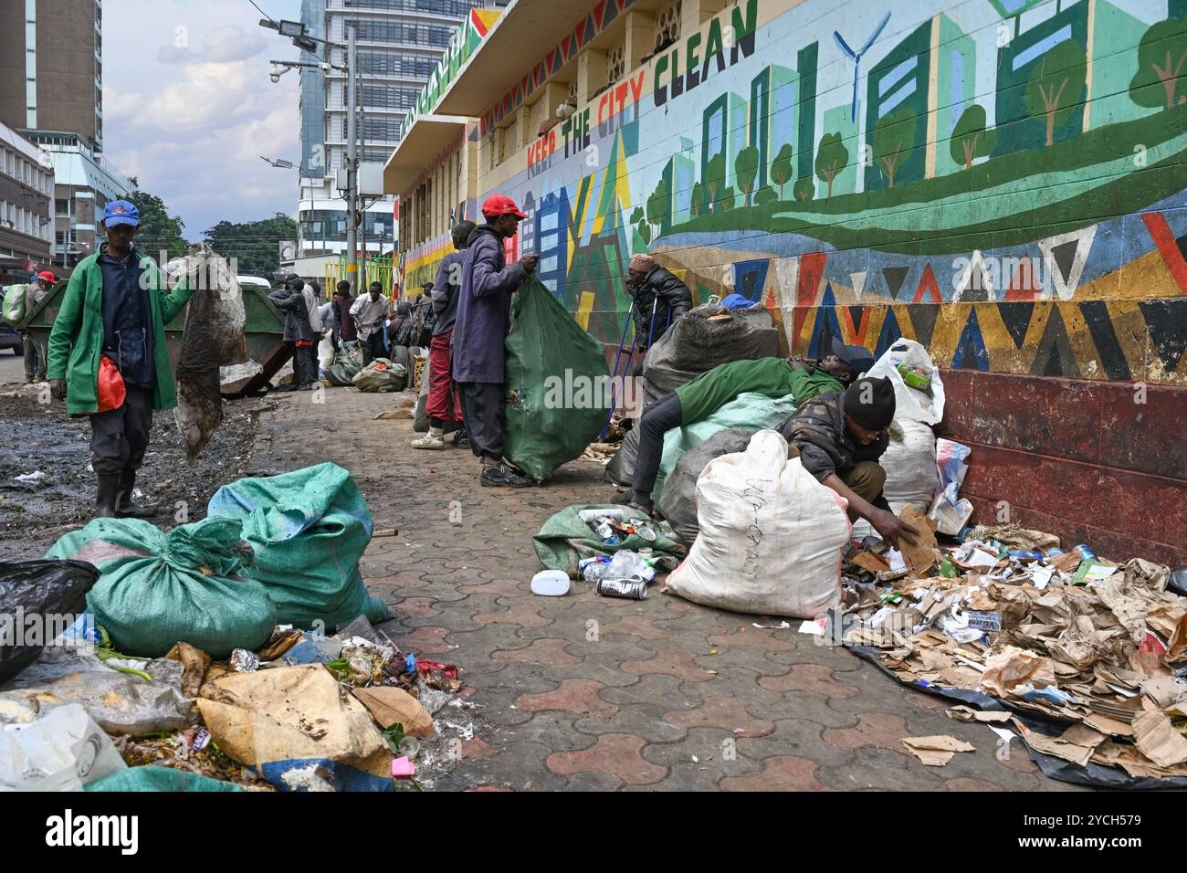 NAIROBI DOWNTOWN, KENYA - NOVEMBER 19, 2022: Homeless and poor people ...