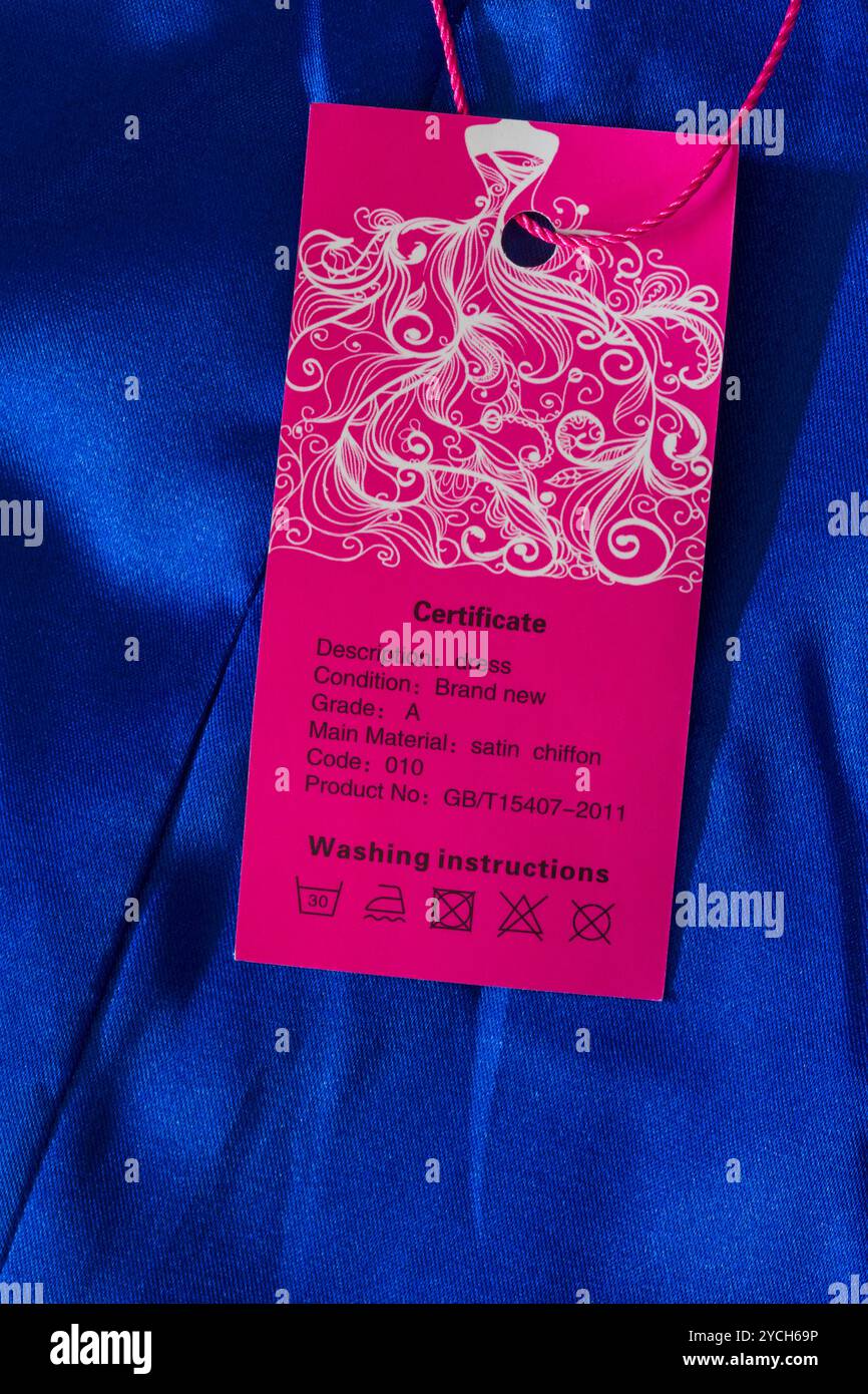 washing care symbols instructions on label tag of womans royal blue ...