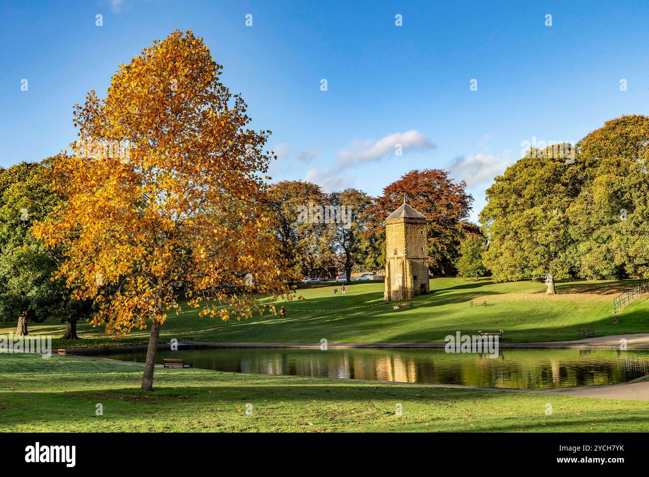The Pigeon Tower and boating lake in Abington Park, Northampton ...