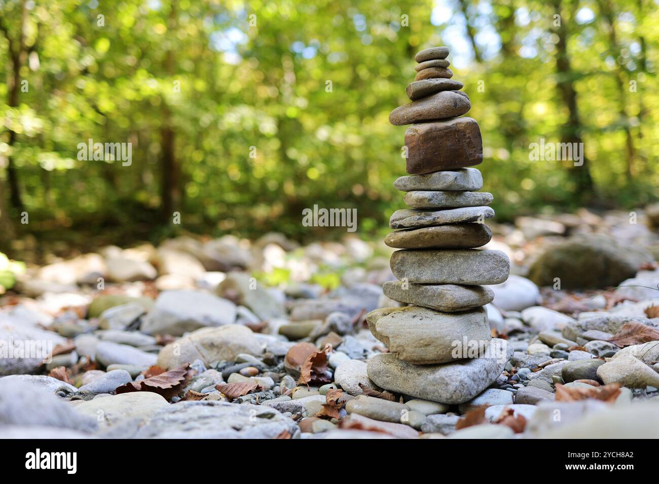 Zen stone pyramid on rocky bank of mountain river. Concept Peace ...