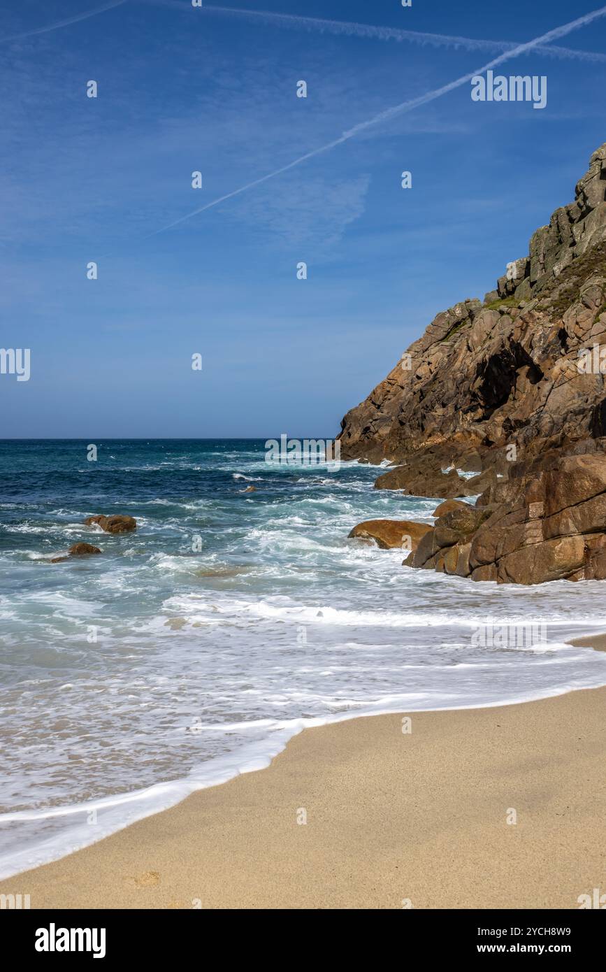 The sandy beach and rugged cliffs at Portheras Cove on the Cornish ...