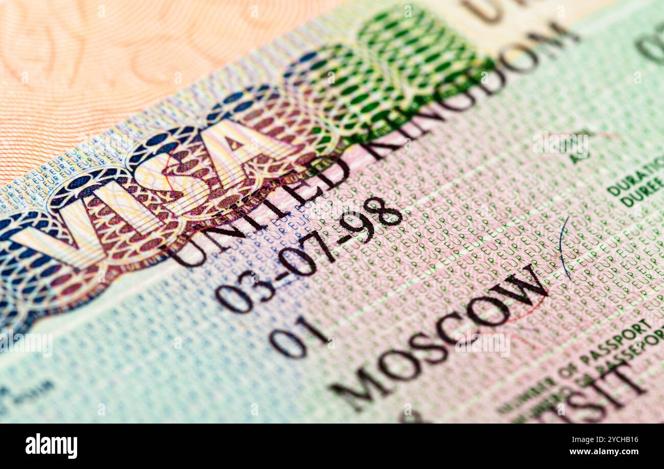 British visa entry and exit stamps in passport Stock Photo - Alamy
