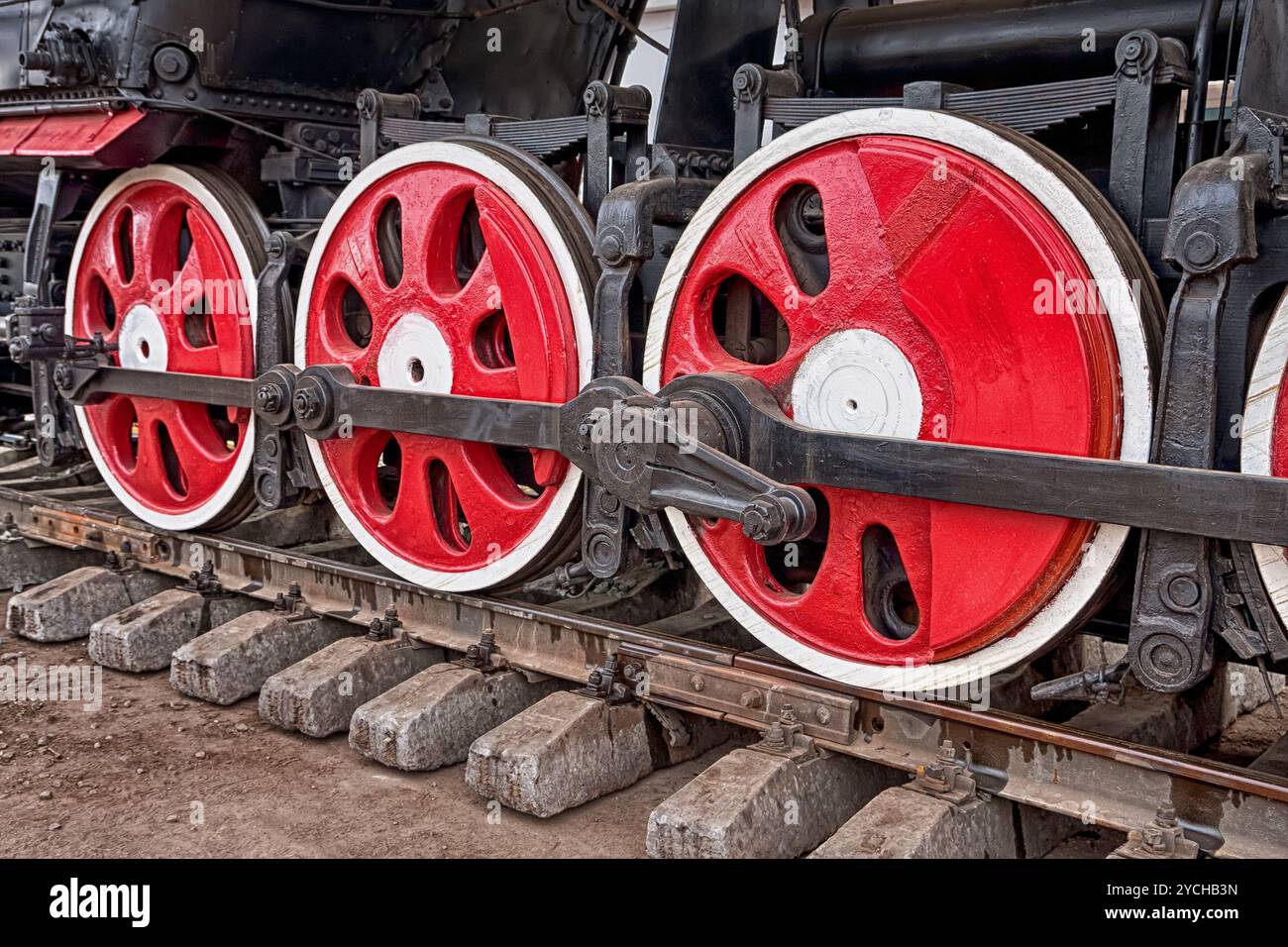 Old steam locomotive engine wheel and rods details Stock Photo - Alamy
