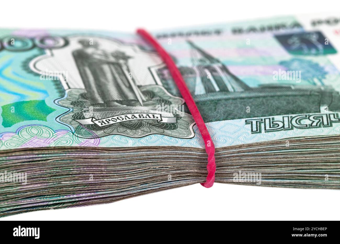Russian rubles wrapped by rubber on white background Stock Photo - Alamy