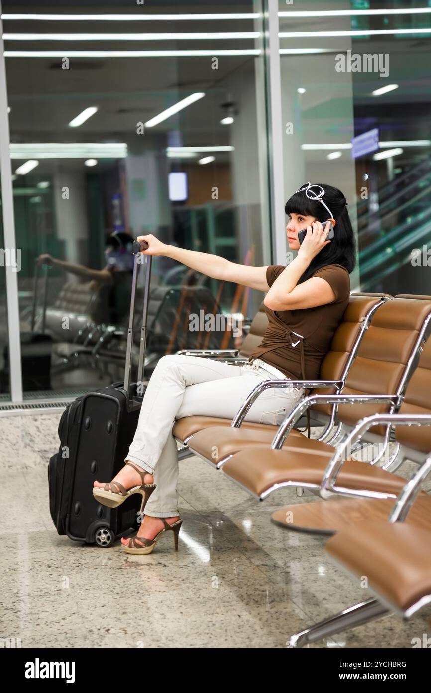 Female passenger mobile phone hi-res stock photography and images - Alamy