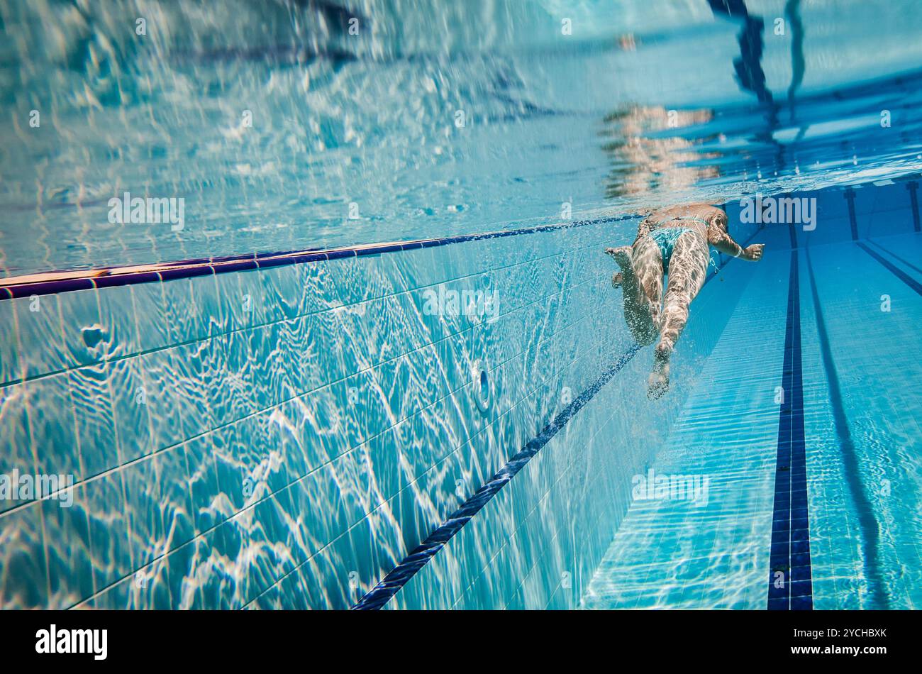 Person underwater swimming pool hi-res stock photography and images - Alamy