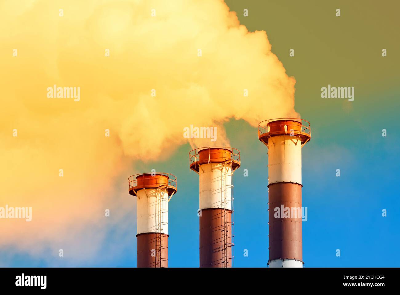 Smoking chimneys other blue sky Stock Photo - Alamy