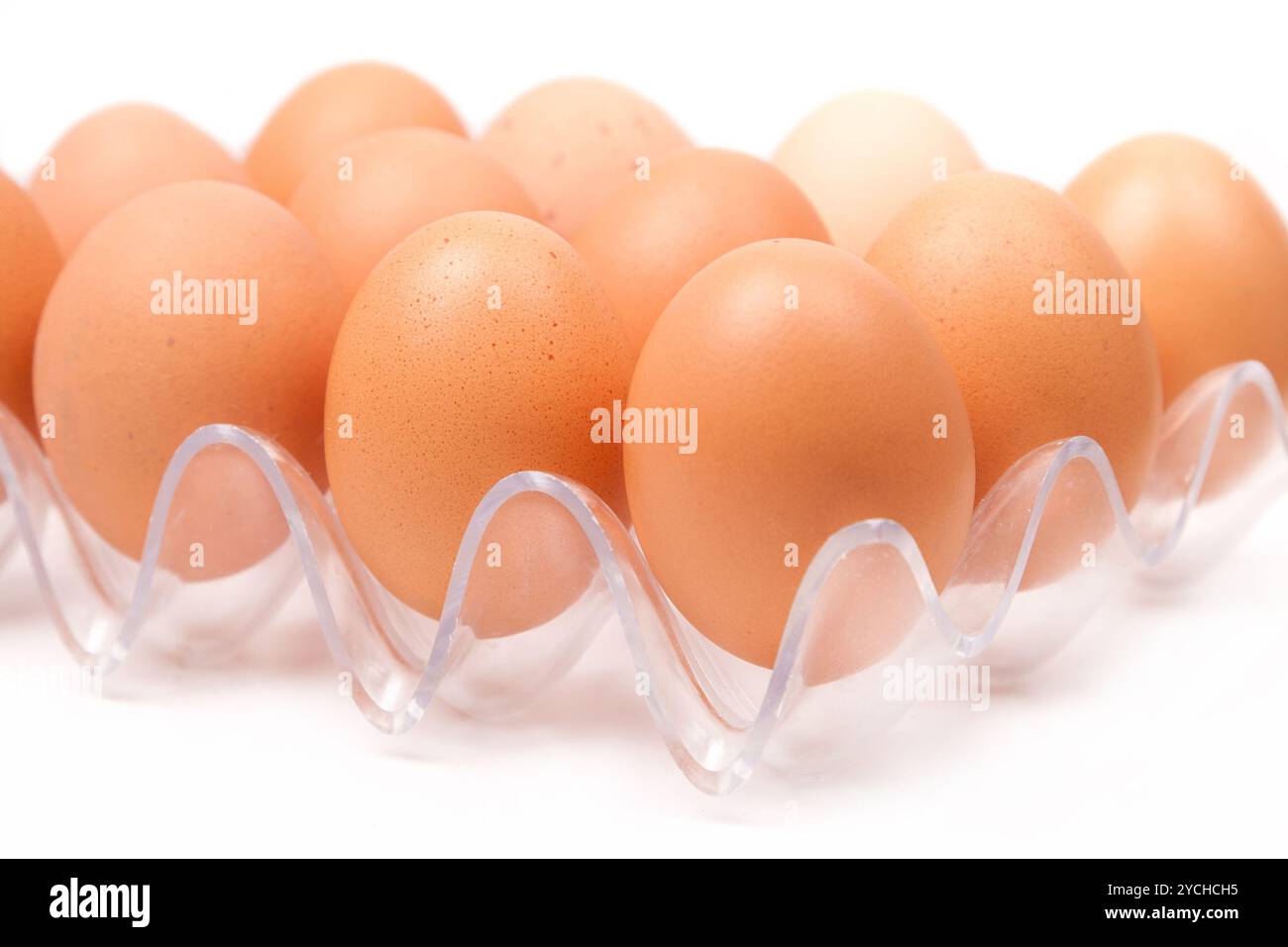 Fresh yellow chicken eggs in container Stock Photo - Alamy