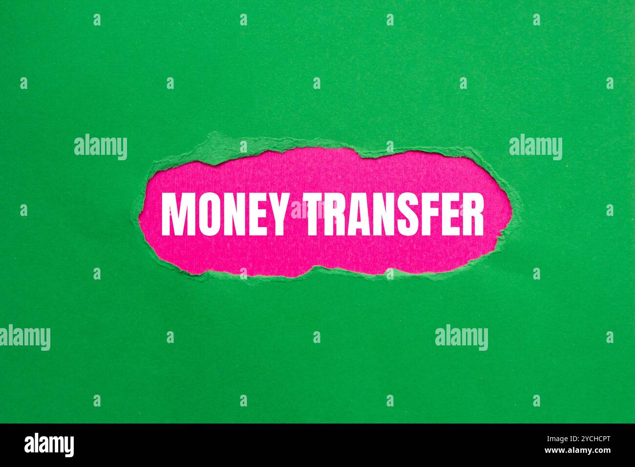Money transfer message written on ripped torn green paper with pink ...
