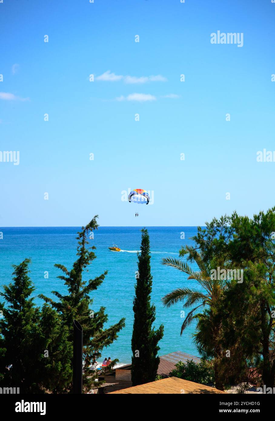 Colorful yellow blue parasail hi-res stock photography and images - Alamy