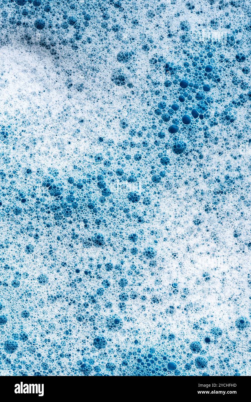 Background and pattern. White soap foam with bubbles, texture on blue ...