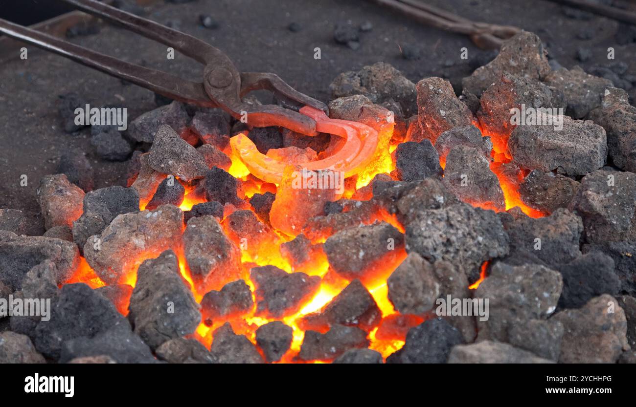 Craftsman forging iron tool in hi-res stock photography and images - Alamy