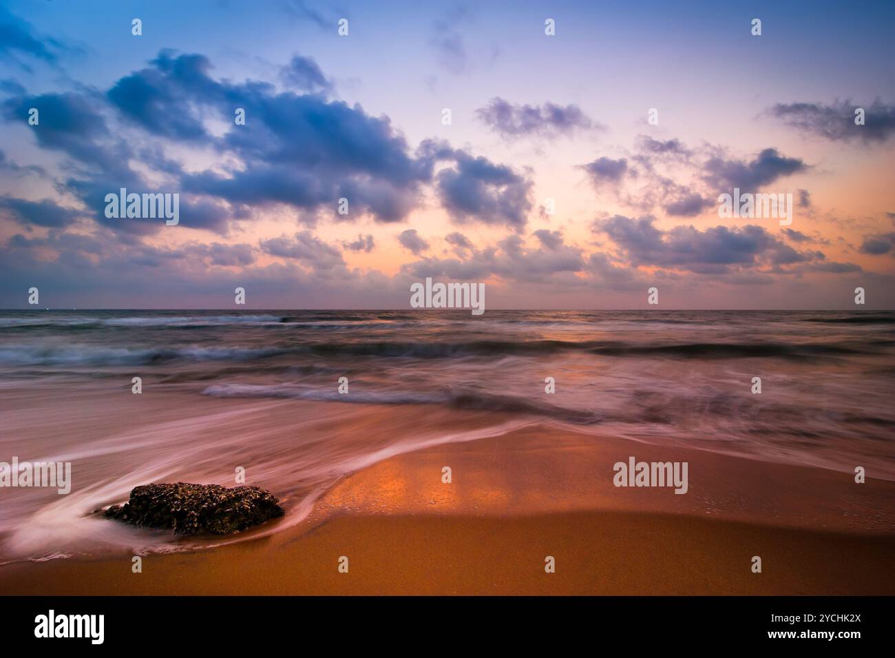 Sunset at tropical beach. South India Stock Photo - Alamy